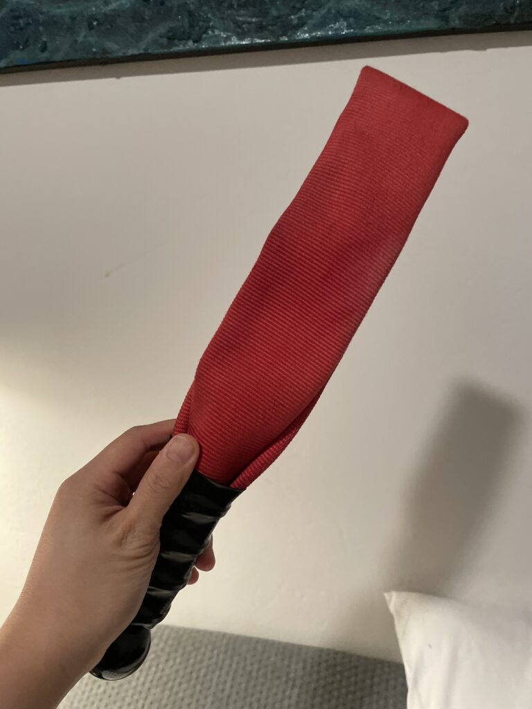 BDSM Impact Paddle, Weighted Fire Hose - The Kink Shop